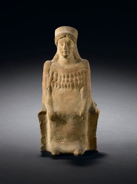 Bonhams : A Greek hollow terracotta figure of an enthroned goddess