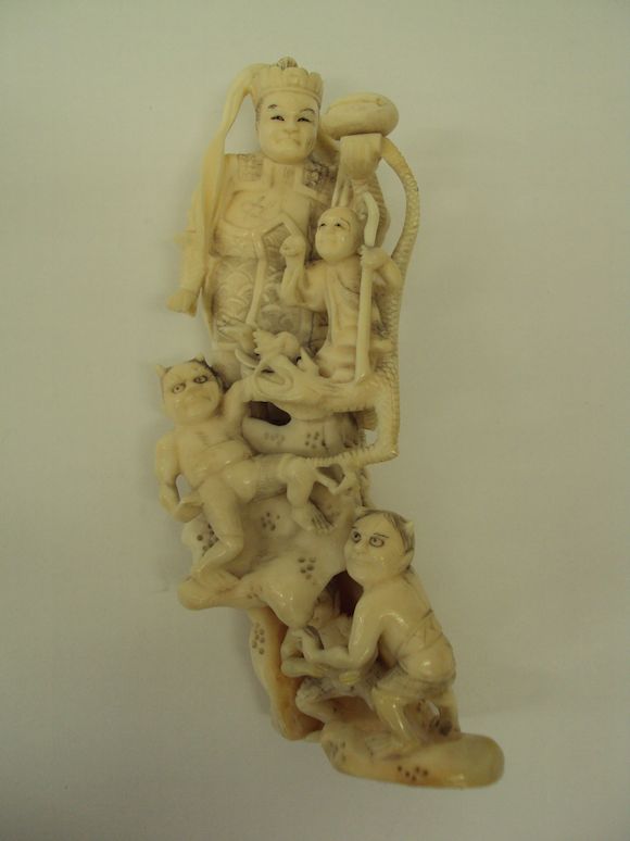 Bonhams : A carved bone figure group Meiji