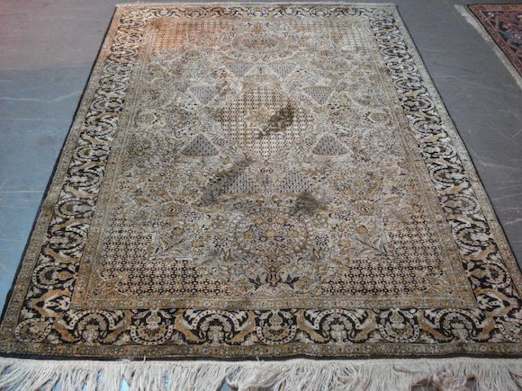 Bonhams : A Ghom silk rug Central Persia, 205cm x 142cm