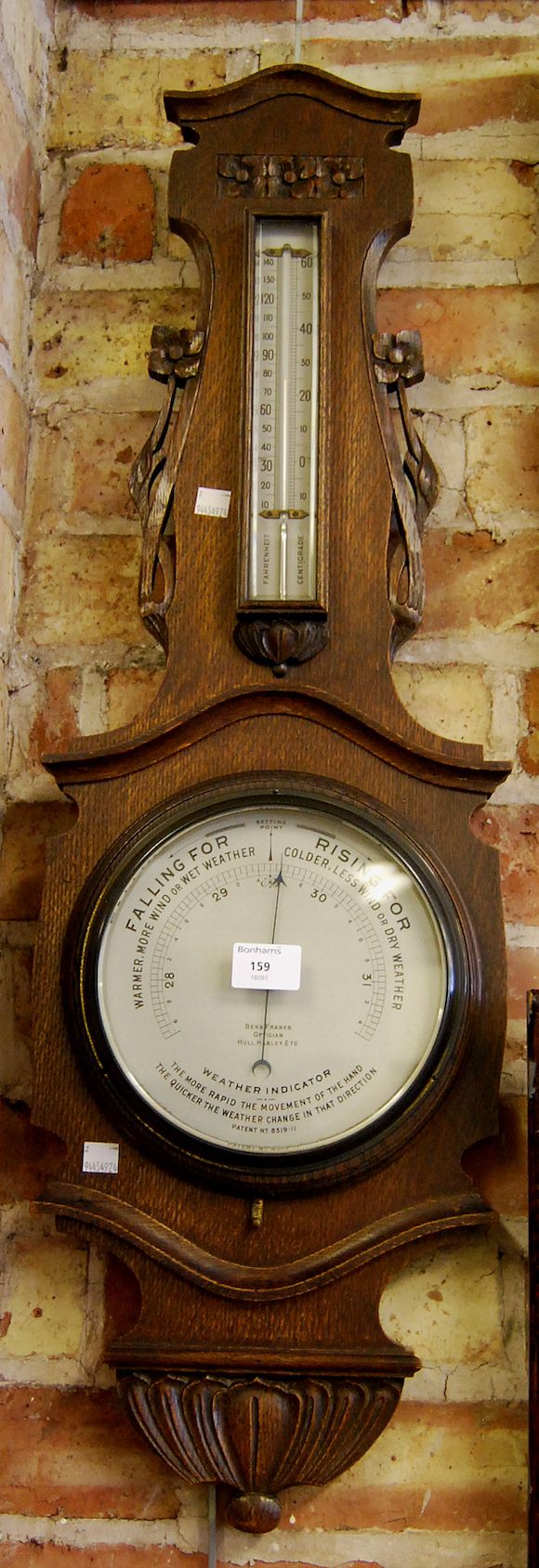 Bonhams : An early 20th century oak-cased wall barometer