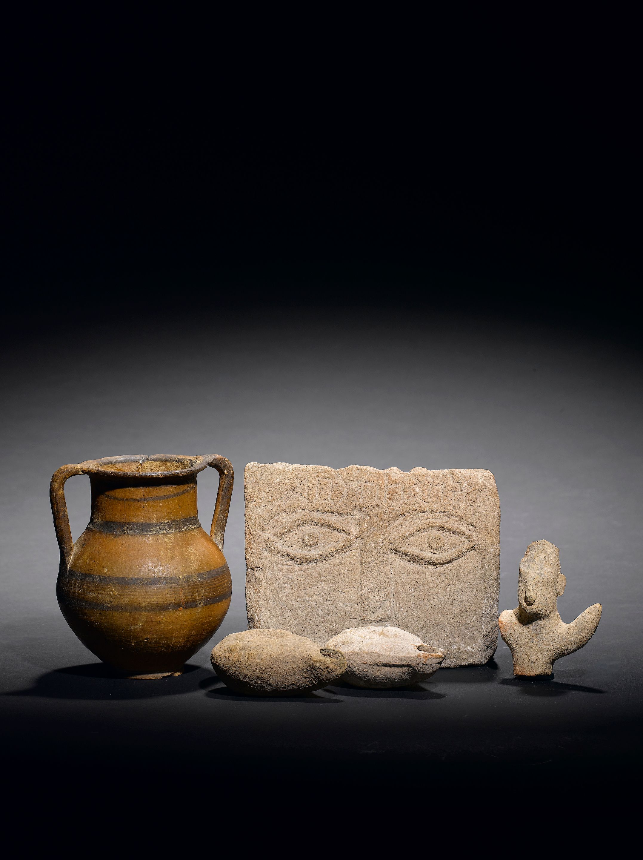 Bonhams : A South Arabian limestone anthropomorphic stele three Cypriot ...