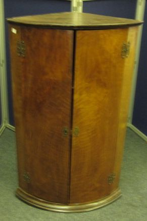 Bonhams : A George III mahogany bowfront corner cabinet, with moulded ...