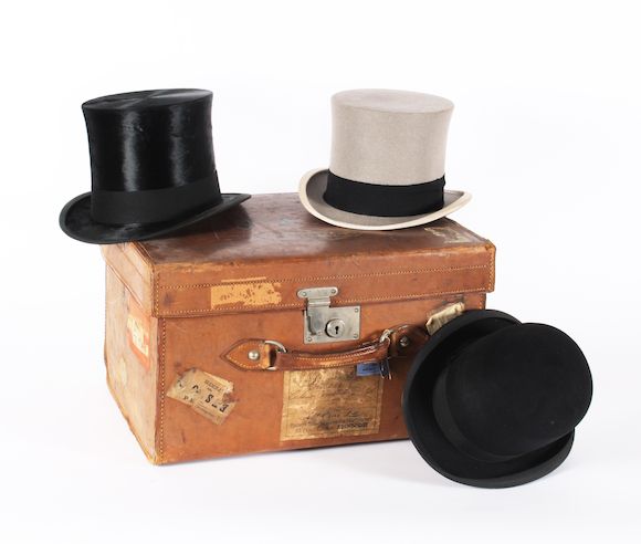 Bonhams : Two top hats and a bowler hat in a leather case