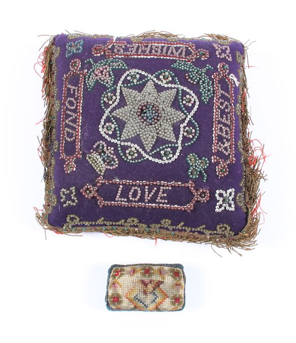 Bonhams : A large Victorian pinwork decorated pin cushion and a small ...