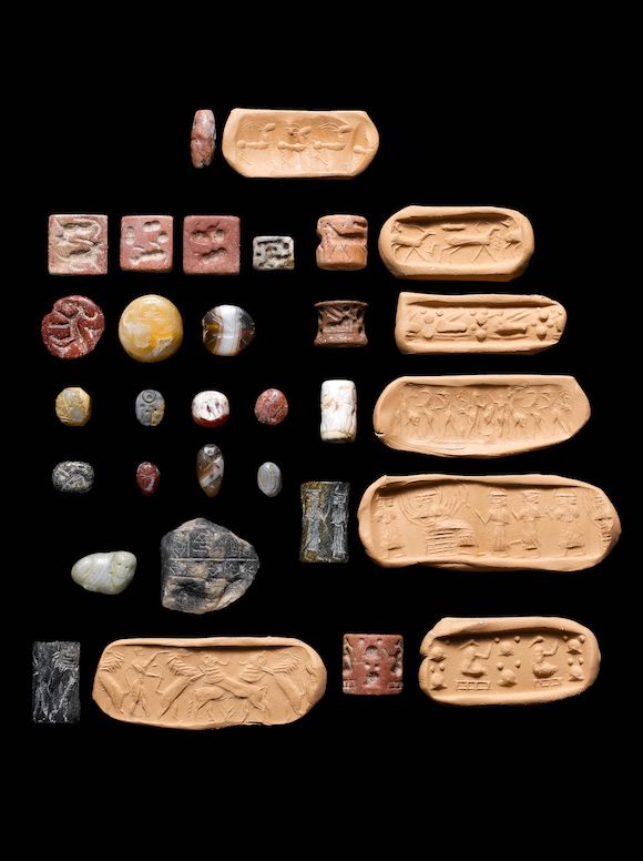 Bonhams : A group of Near Eastern seals and a cuneiform black stone ...
