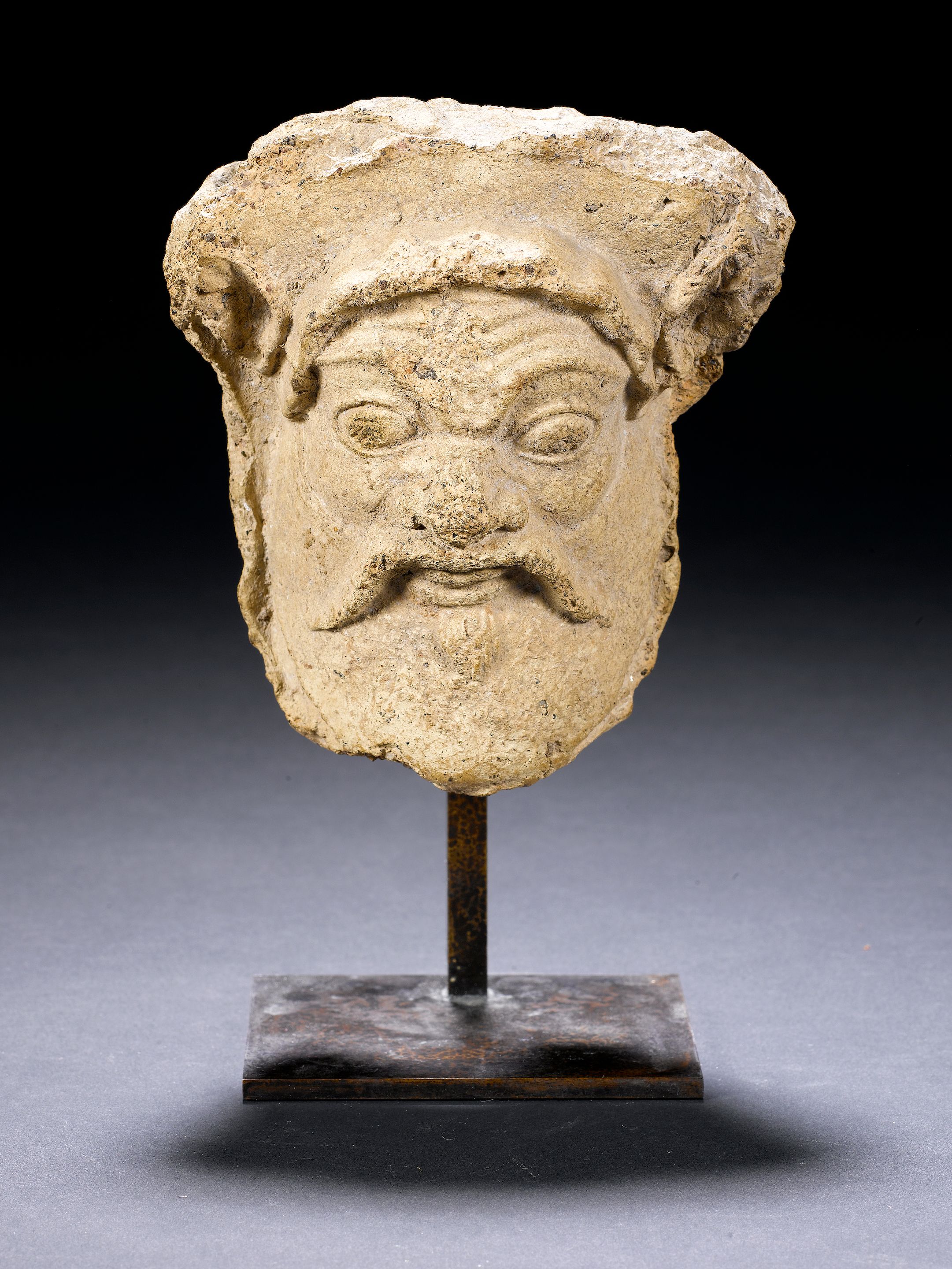 Bonhams : An Etruscan terracotta antefix fragment