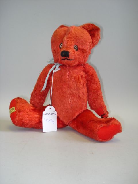 Bonhams : Red plush Merrythought Teddy bear, 1930's