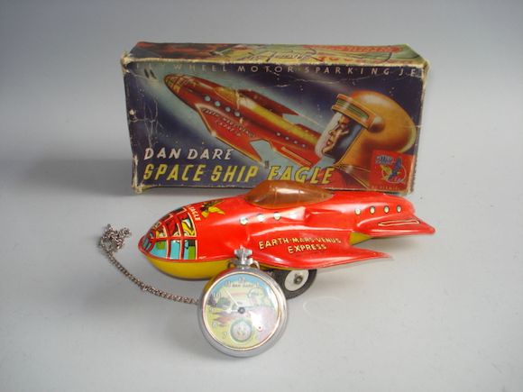 Bonhams : Dan Dare Pocket Watch and Space Ship toy. 2