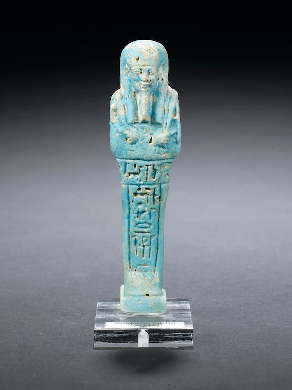 Bonhams : An Egyptian blue glazed composition shabti for Bak-Hor
