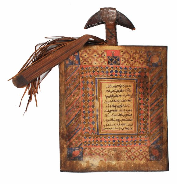 Bonhams : An African wooden prayer tablet