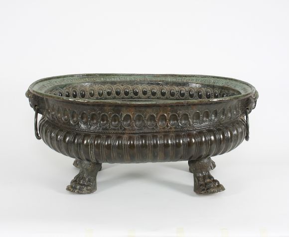 Bonhams : A fine and large repousse-decorated copper wine-cistern or ...
