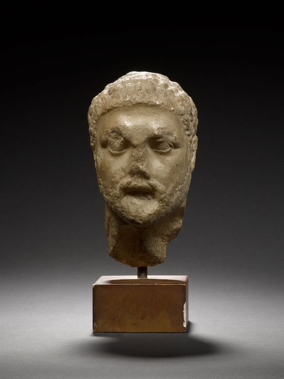 Bonhams : A Hellenistic marble portrait head of bearded man