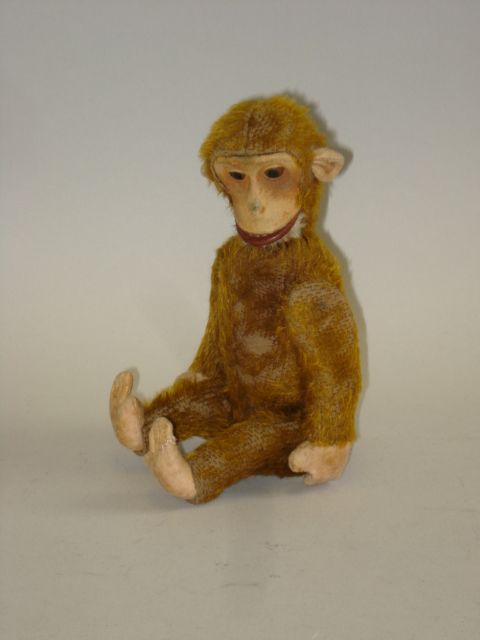 Bonhams : Schuco yes/no Monkey, 1920's
