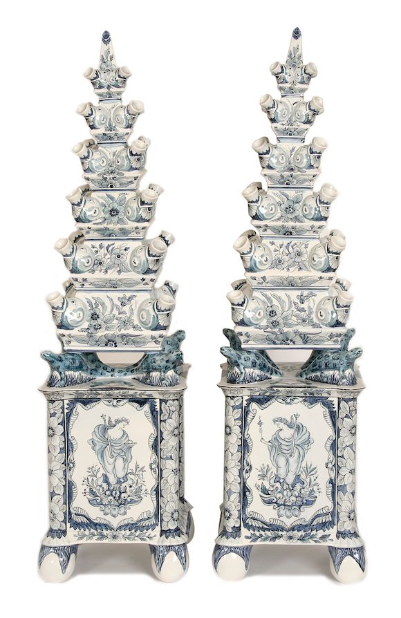Bonhams : A large pair of Delft style blue and white glazed tulip towers
