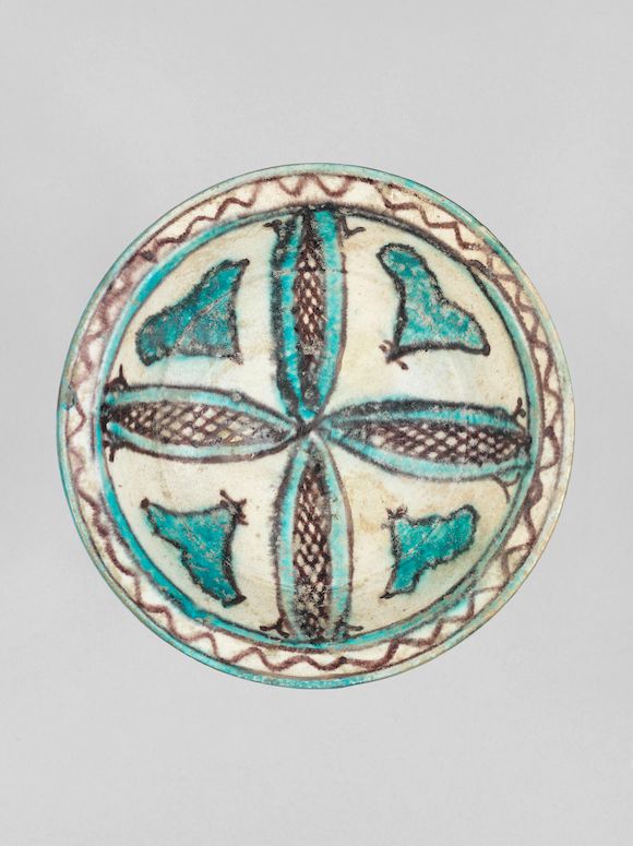 Bonhams : A Timurid Varamin-type underglaze-painted pottery Dish Persia ...