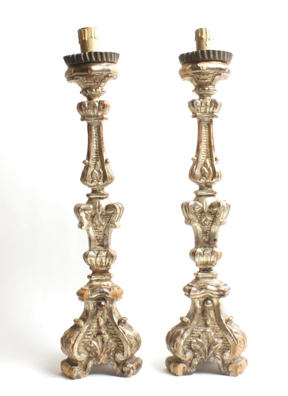 Bonhams : A pair of early 20th century wooden candlesticks of ...