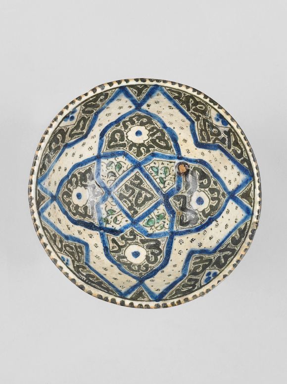 Bonhams : A Timurid underglaze-painted pottery Bowl Persia, 14th Century