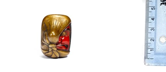 Bonhams : A lacquered-wood netsuke of a konoha tengu mask 19th century