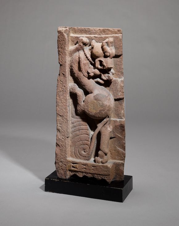 Bonhams : A pink sandstone Relief Fragment depicting a Mythical Lion ...