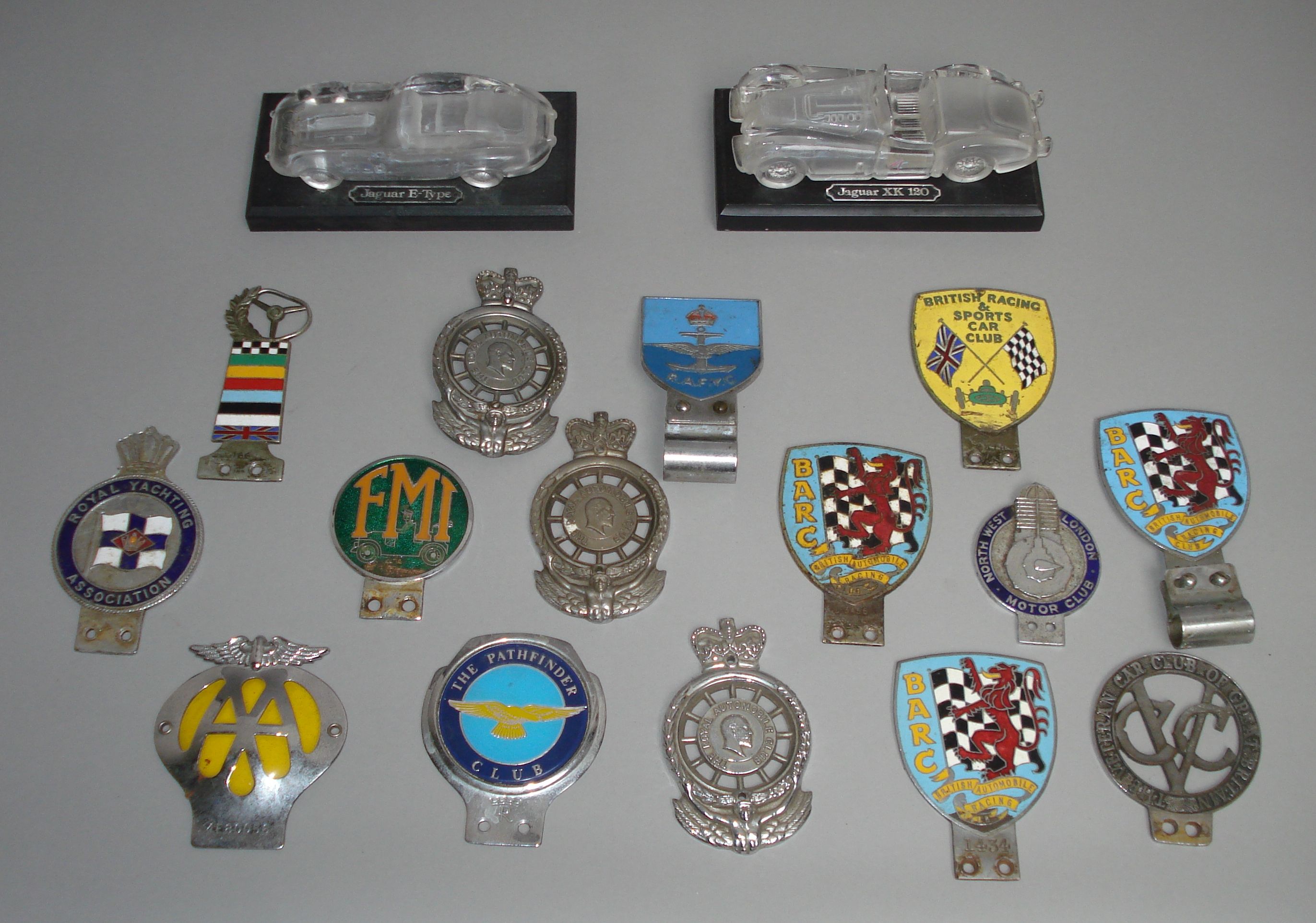 Bonhams Cars : A lot of motoring badges,