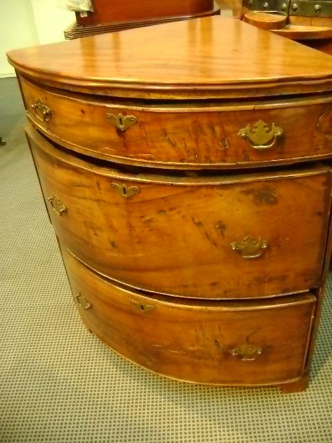 Bonhams : A bow front corner chest of three drawers