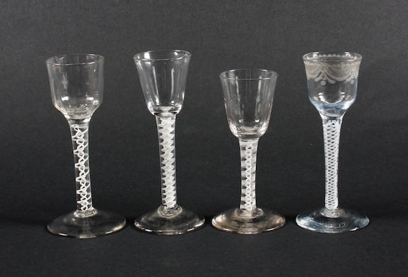 Bonhams Four Opaque Twist Wine Glasses Circa 1760