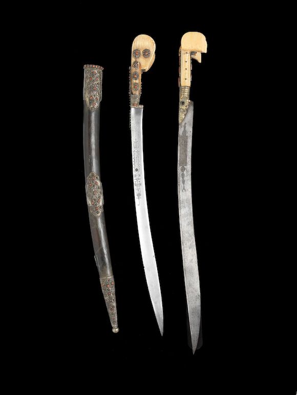 Bonhams : An Ottoman ivory-hilted steel Sword (yataghan) signed by the ...