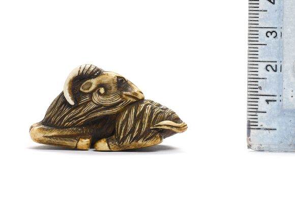 Bonhams : An ivory netsuke of a goat Early 19th century