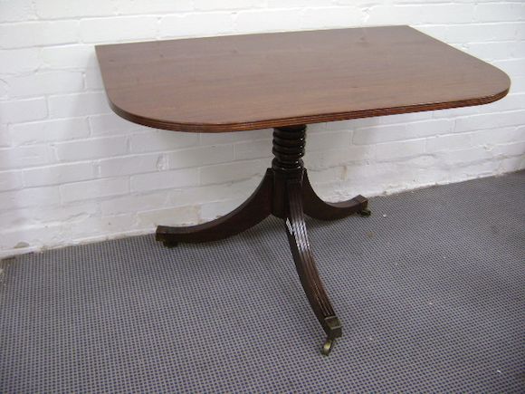 Bonhams : A mahogany two pillar extending dining table,George III and ...