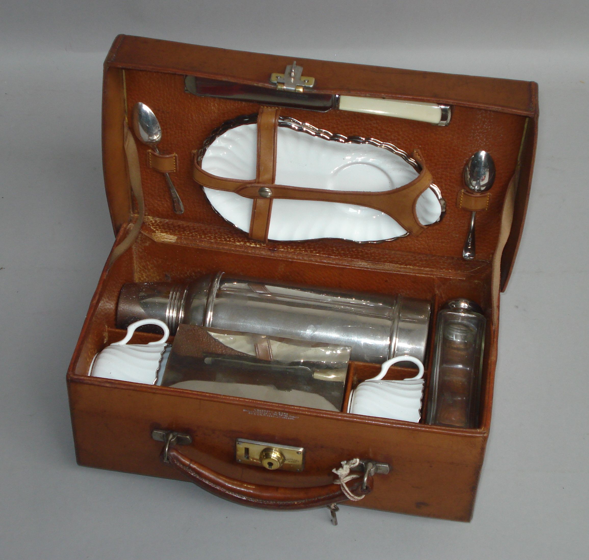 Bonhams Cars : A two-person picnic set, by Barrett & Sons,