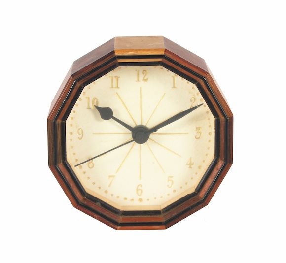 Bonhams : A small Hugh Birkett multi-wood wall timepiece