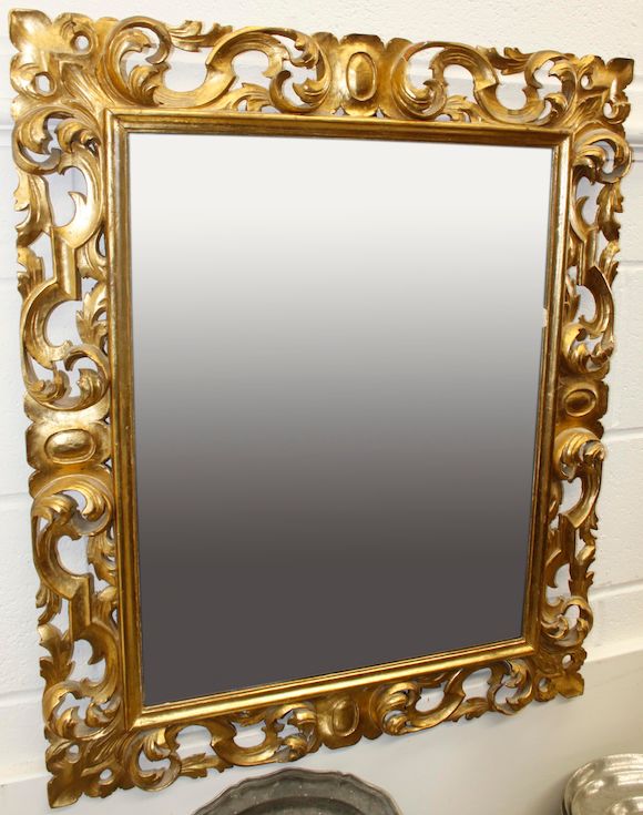 Bonhams : A florentine style giltwood mirror frame,