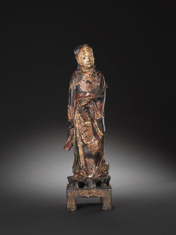Bonhams : A gilt-lacquered bronze figure of a lady Ming Dynasty