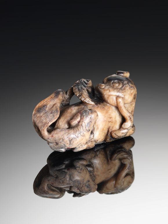 Bonhams : A black and yellow jade 'qilin' group Ming Dynasty