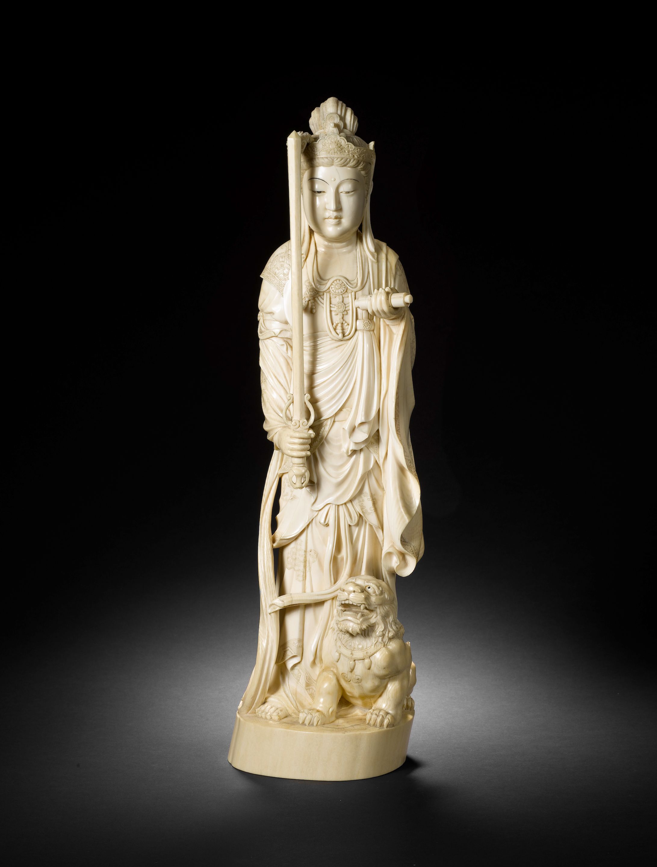 Bonhams : A tall ivory figure of Monju Bosatsu By Seimin, Meiji Period