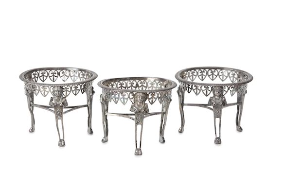 Bonhams : Three Empire silver salt holders