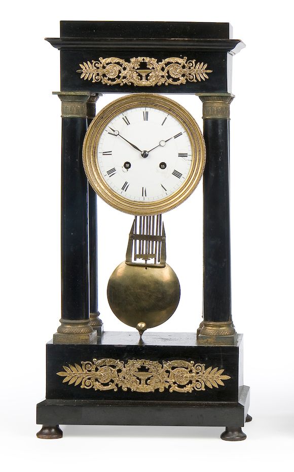 Bonhams : A 19th century Empire style gilt metal mounted portico clock ...