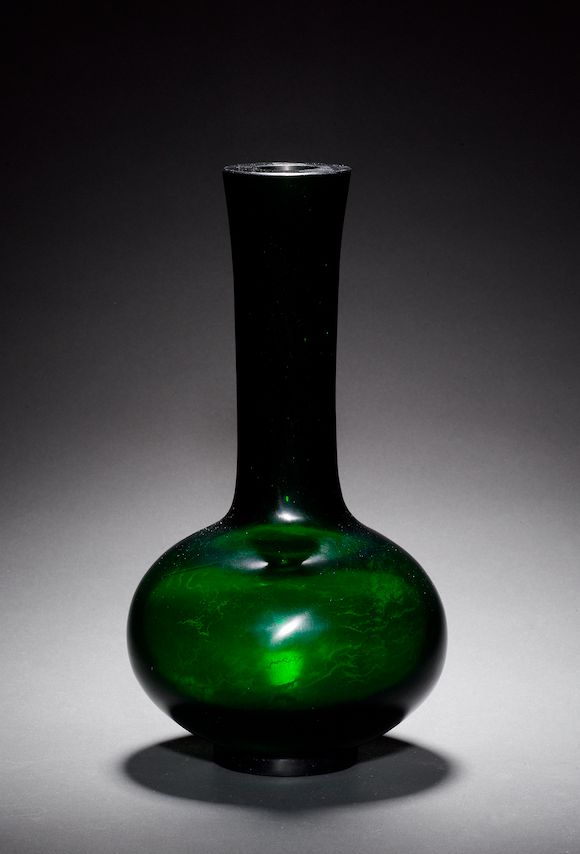 Bonhams : A green glass vase with tapering cylindrical neck and oviform ...