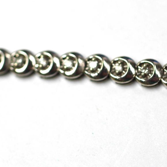 Bonhams : A diamond set line bracelet,