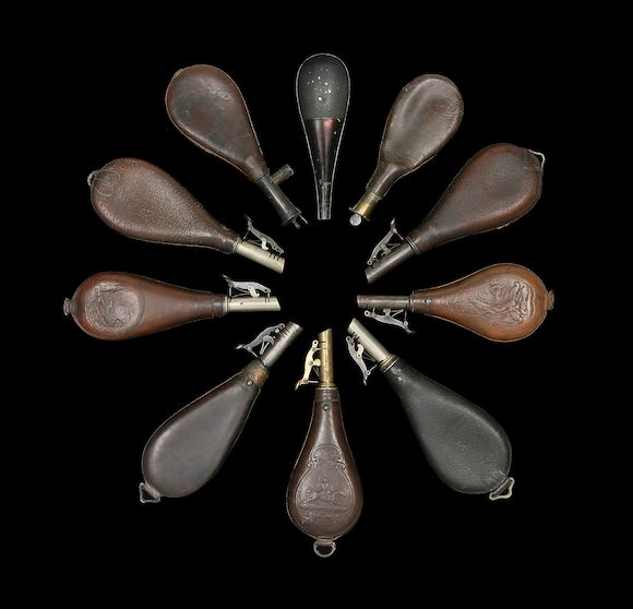 Bonhams : Nine Various Shot-Flasks, And A Japanned Shot Funnel