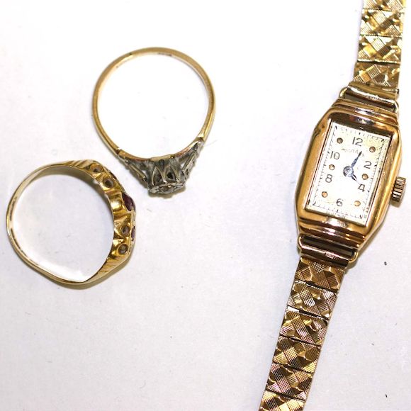 Bonhams : Rotary: a gold cased rectangular wrist watch, on diamond cut ...