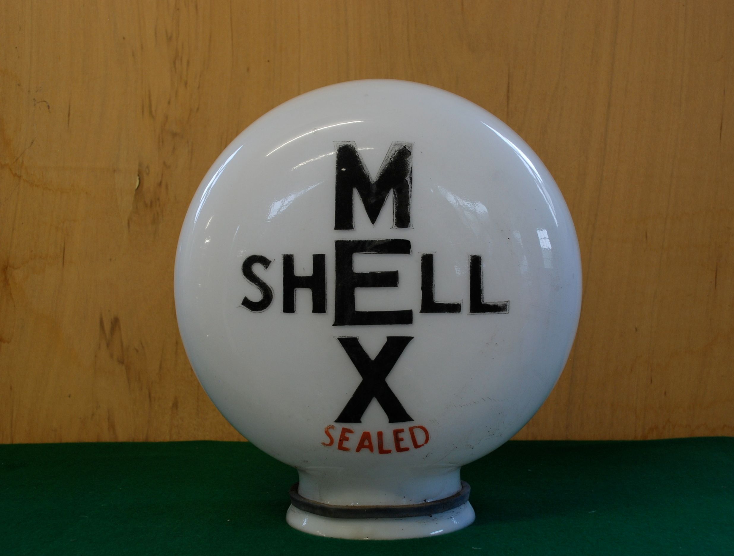Bonhams Cars : A Shell Mex glass petrol pump globe,