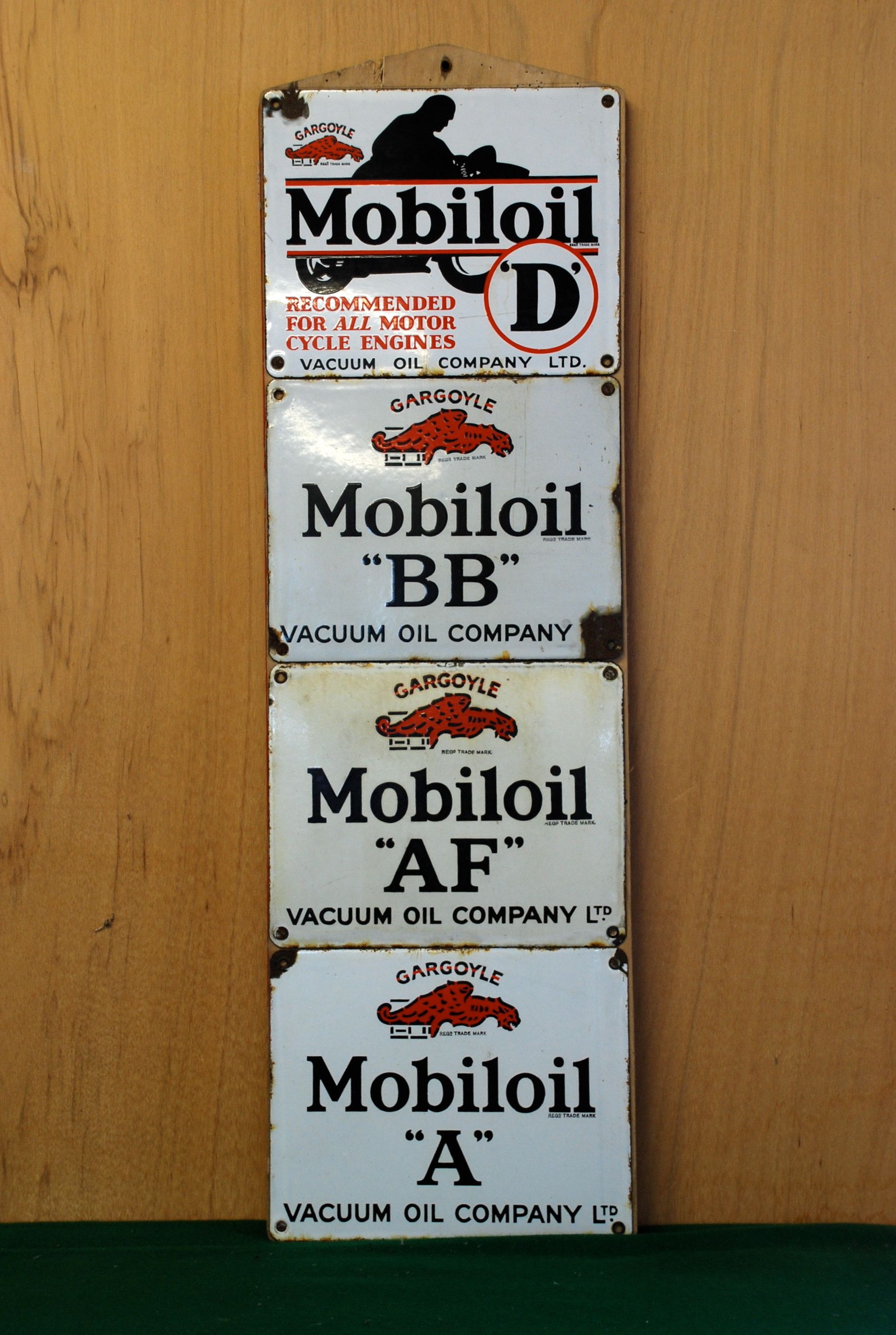 Bonhams Cars : Four Mobiloil enamel signs