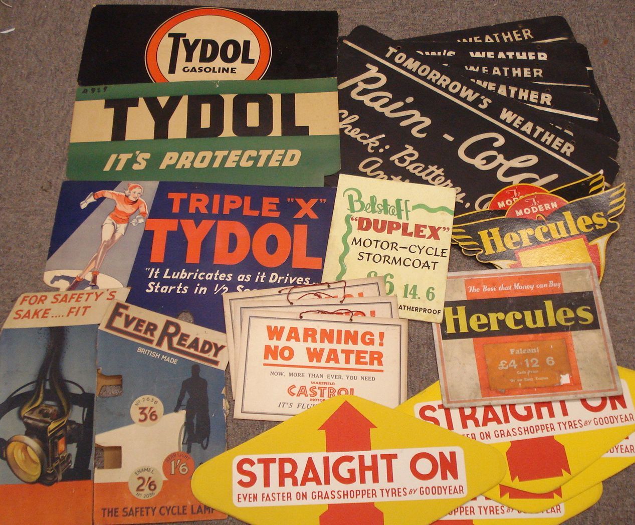 Bonhams Cars : A collection of cardboard advertising signs,