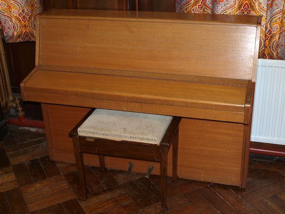 Bonhams : A modern oak framed upright overstrung piano, by Kemble