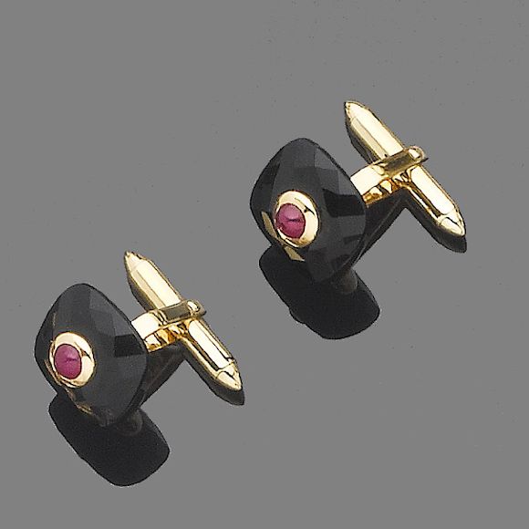 Bonhams : A pair of onyx and ruby cufflinks