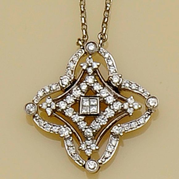 Bonhams : A reversable diamond pendant