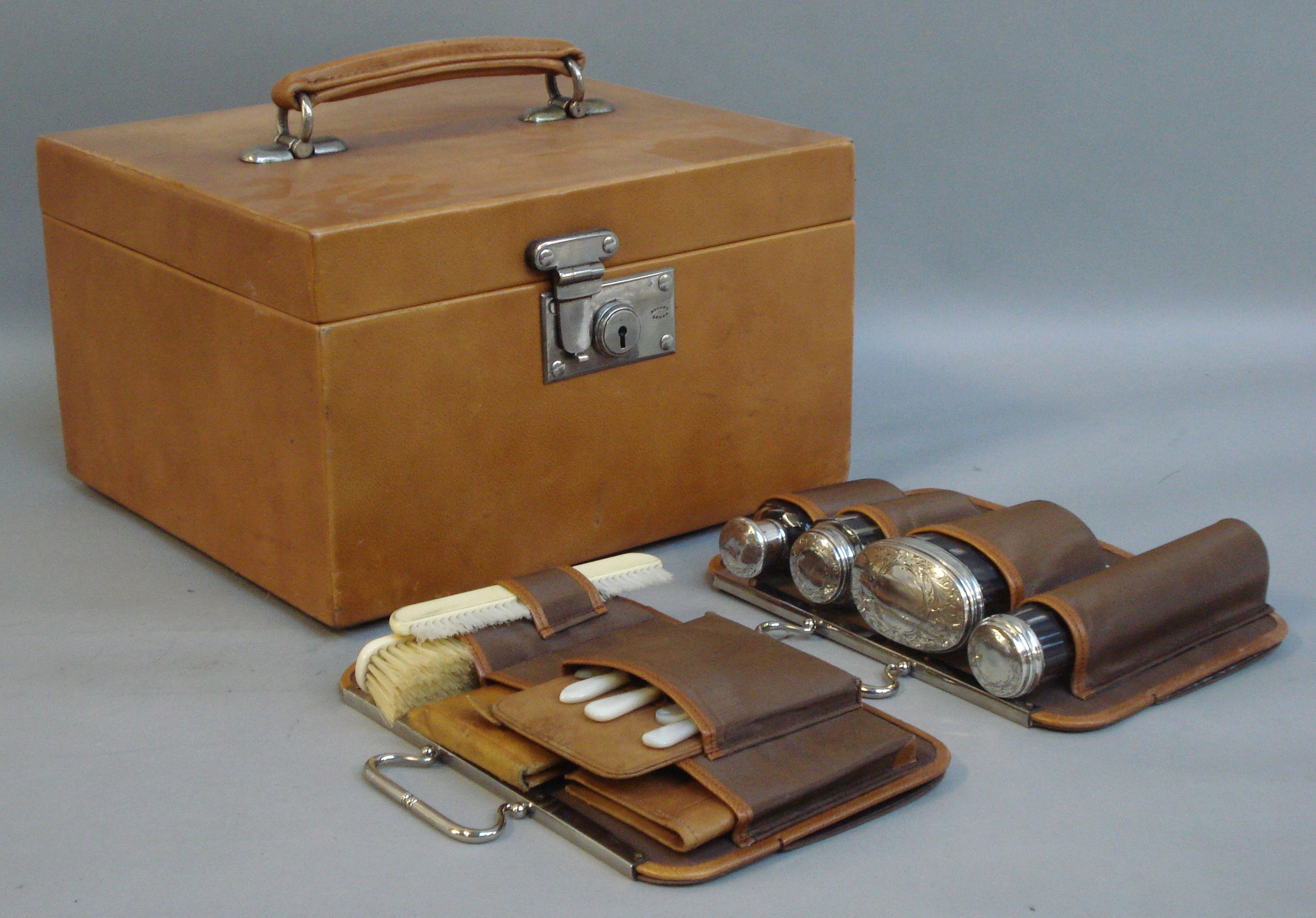 Bonhams Cars : A small tan leather vanity case, British, 1901,