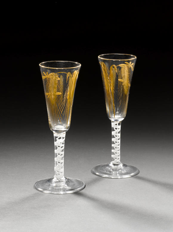 Bonhams A Rare And Fine Pair Of Gilt Opaque Twist Ale Glasses Circa 1765