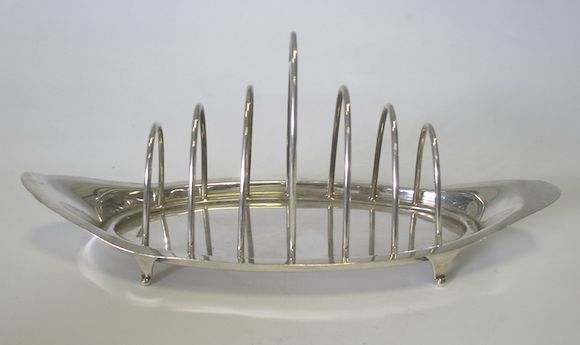 Bonhams : A silver toast rack, by H. Atkins, Sheffield 1922,